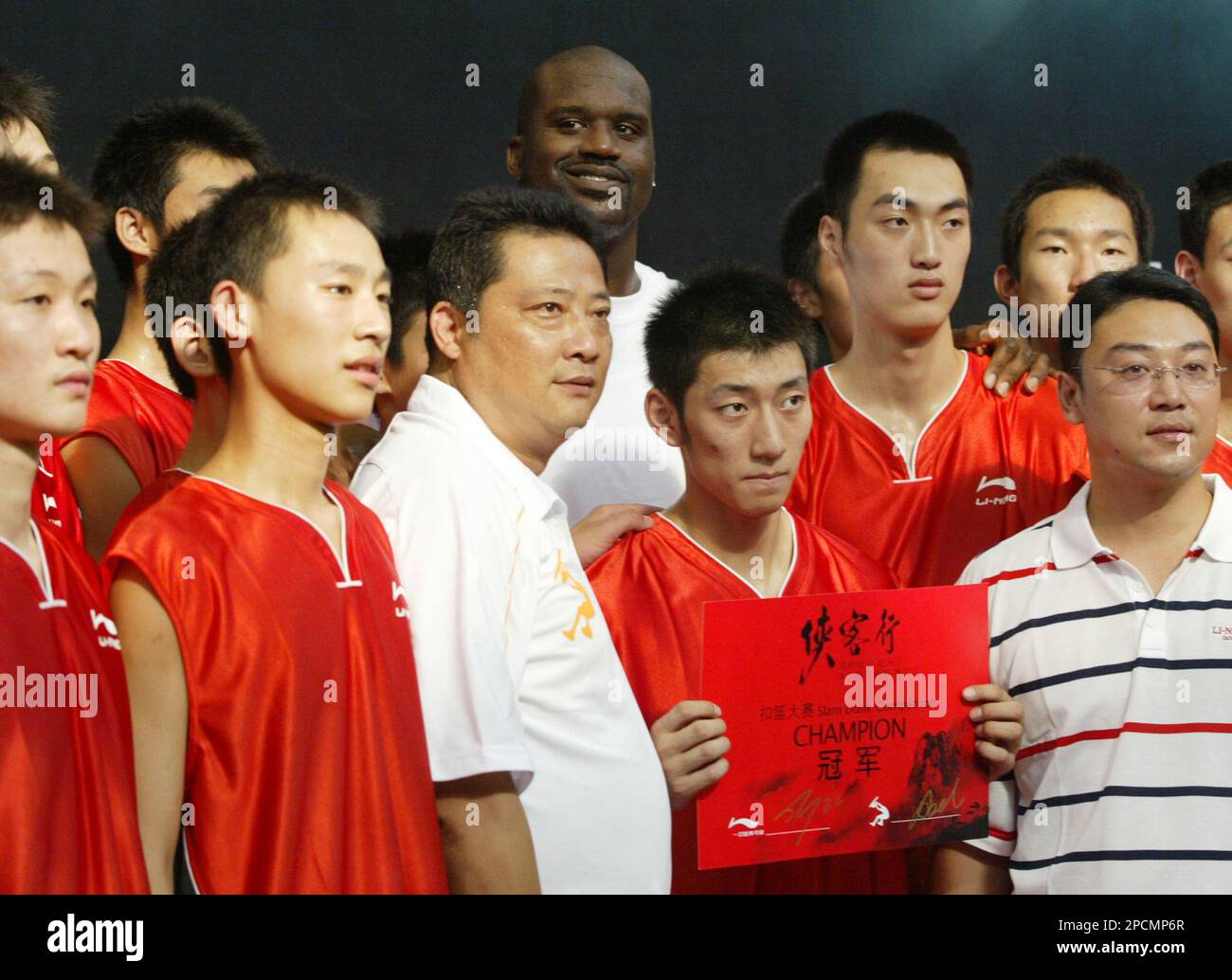 NBA star Shaquille O'Neal of Miami Heat, center top, poses with Chinese ...