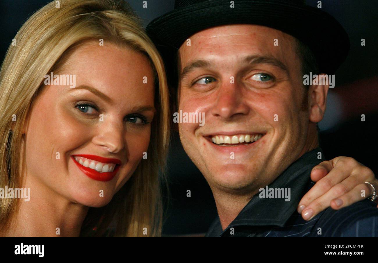 Actors Sunny Mabrey, left, and Ethan Embry pose for photographers at ...