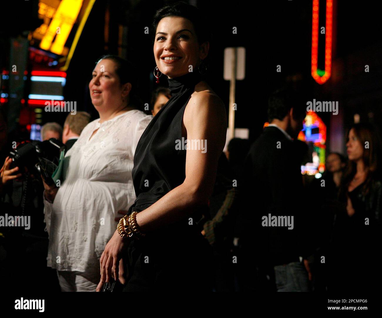 Actress Julianna Margulies poses for photographers at the premiere of ...