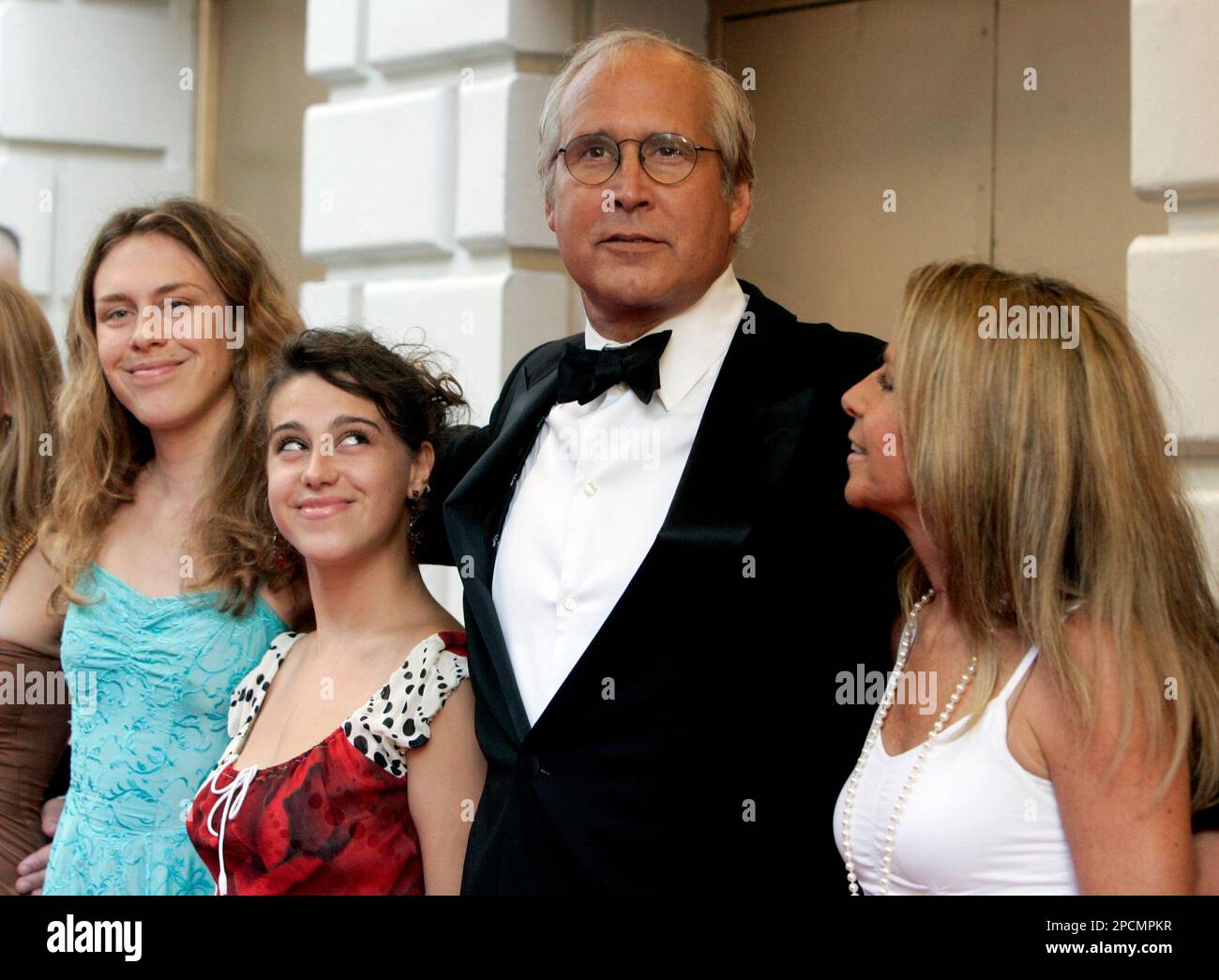 Comedian and actor Chevy Chase arrives with his wife Jaynie, right, and ...