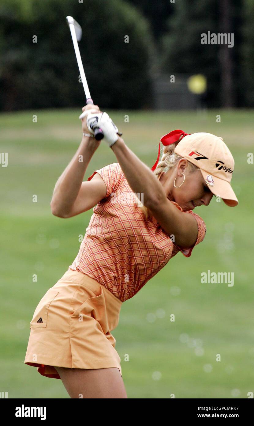 Natalie Gulbis works on her swing as she practices in preparation for ...