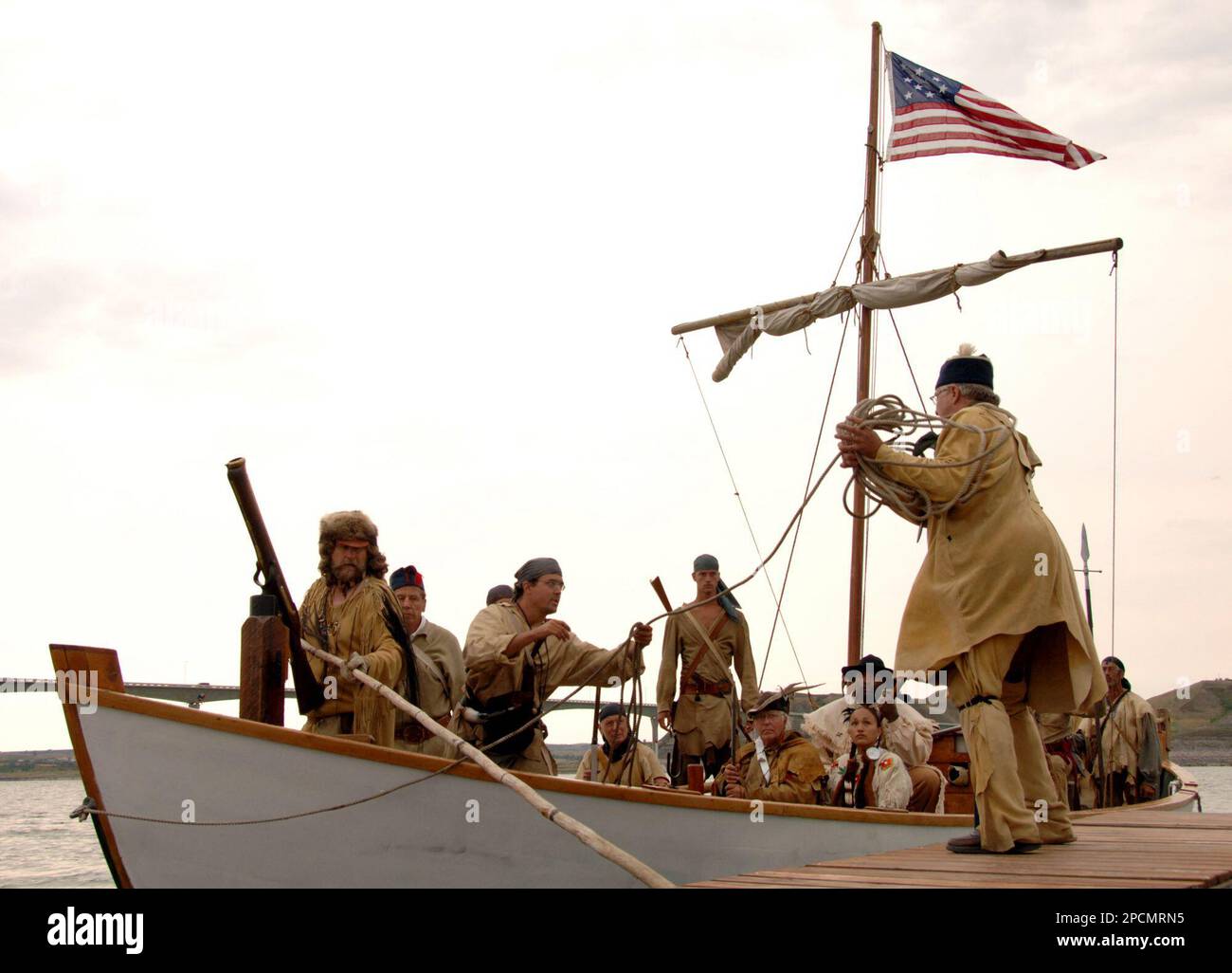 A boat carrying Jessica Grinnell, playing the role of Sakakawea, and ...