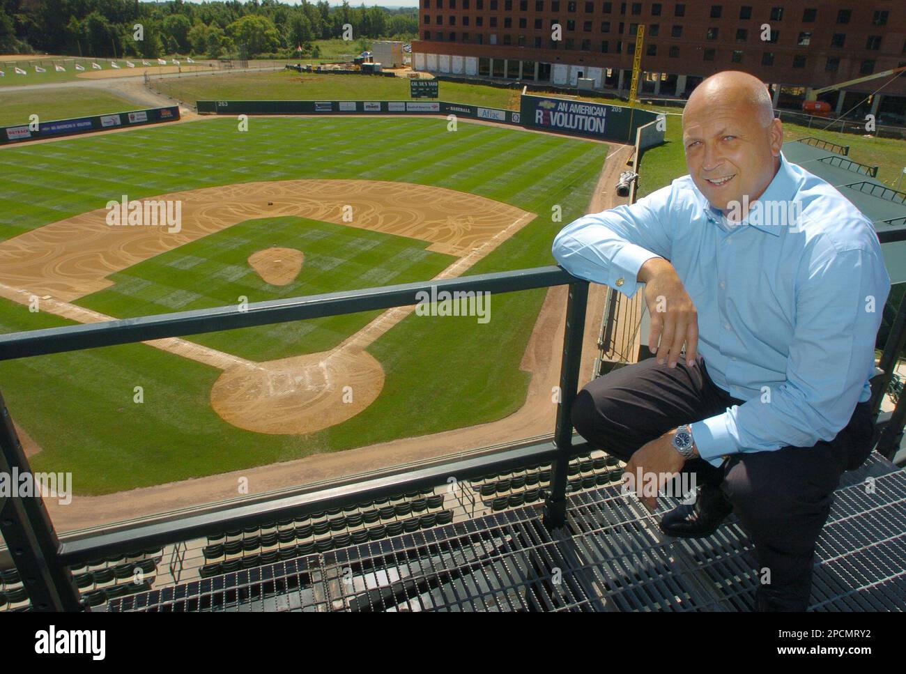 Former Baltimore Orioles baseball player Cal Ripken smiles high above ...