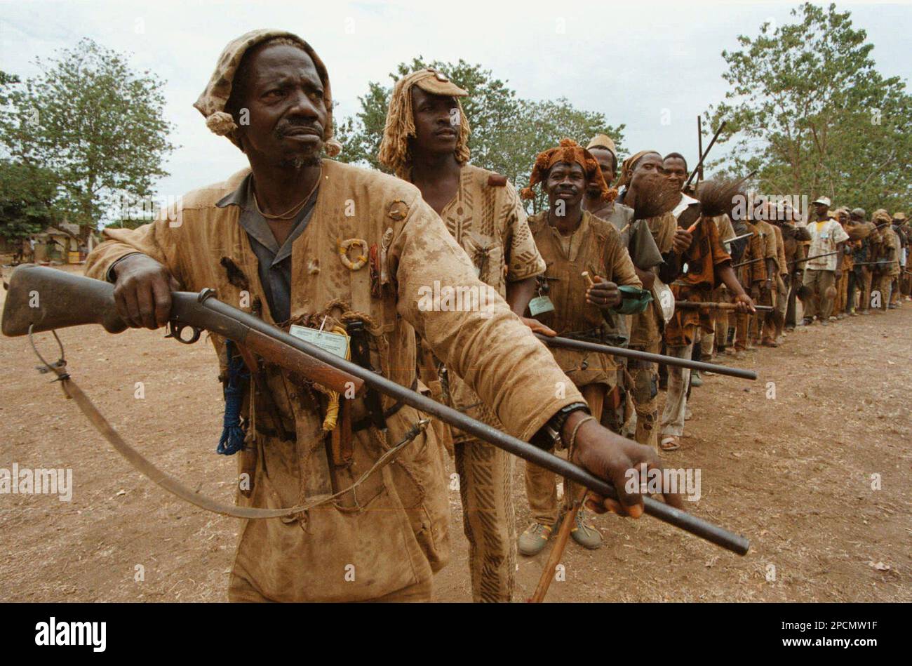 ** FILE ** A group of Dozos, hunters with powers, in the Malinke ...