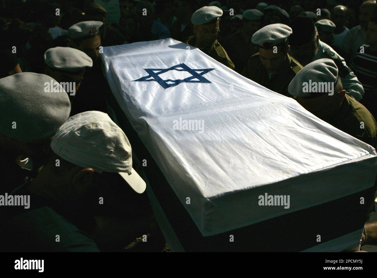 Israeli army soldiers carry for burial the flag-covered coffin of army ...