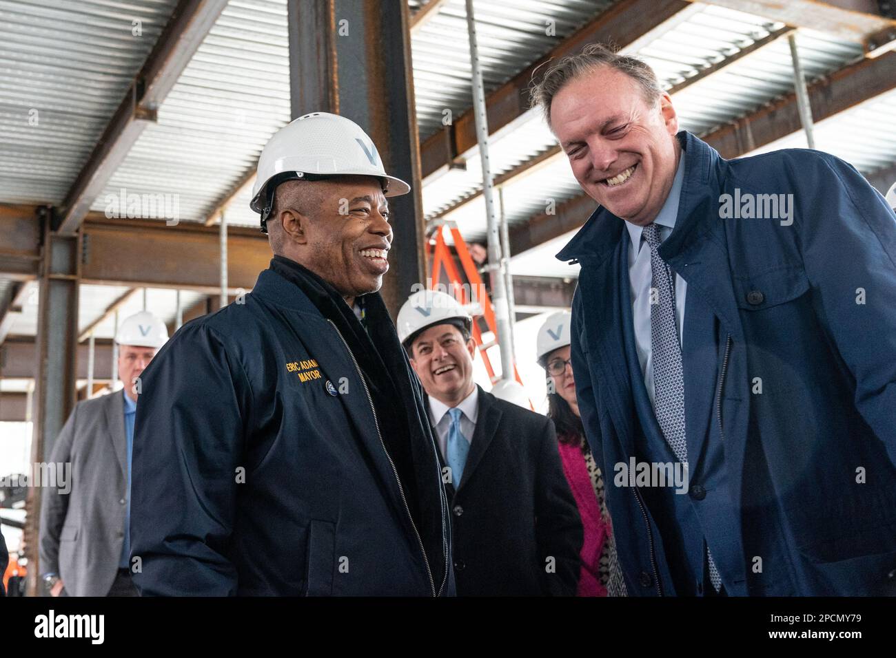Mayor Eric Adams tours of the former office building being converted to ...