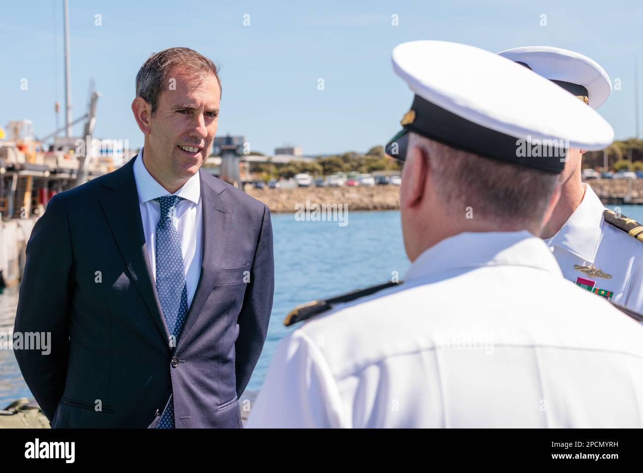 Treasurer Jim Chalmers, talks with Rear Admiral Richard Seif, Commander ...