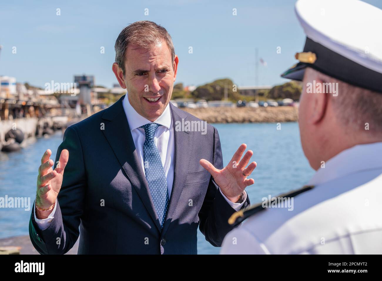Treasurer Jim Chalmers, talks with Rear Admiral Richard Seif, Commander ...