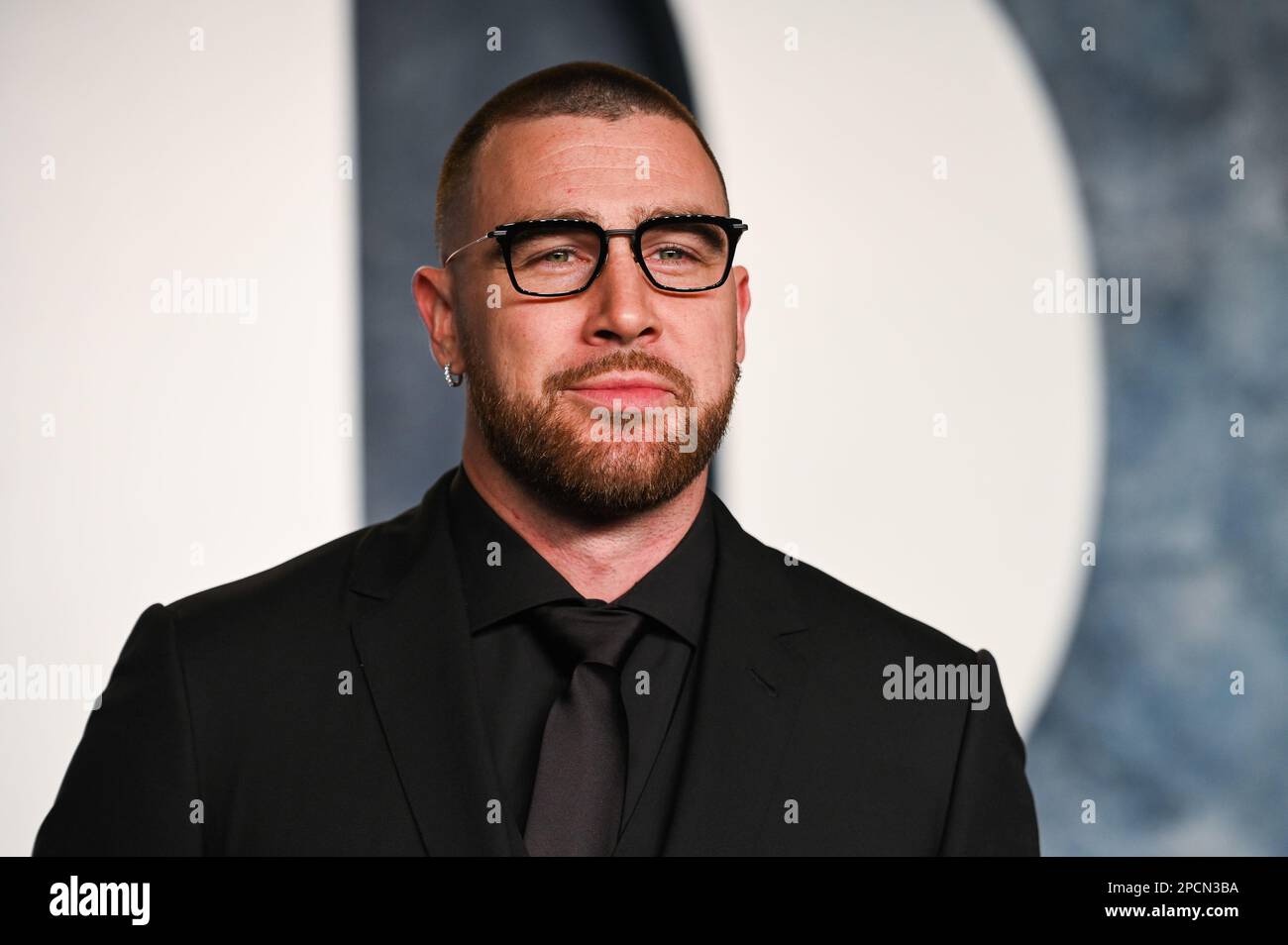 USA. 12th Mar, 2023. Travis Kelce walking on the red carpet at the 2023 ...
