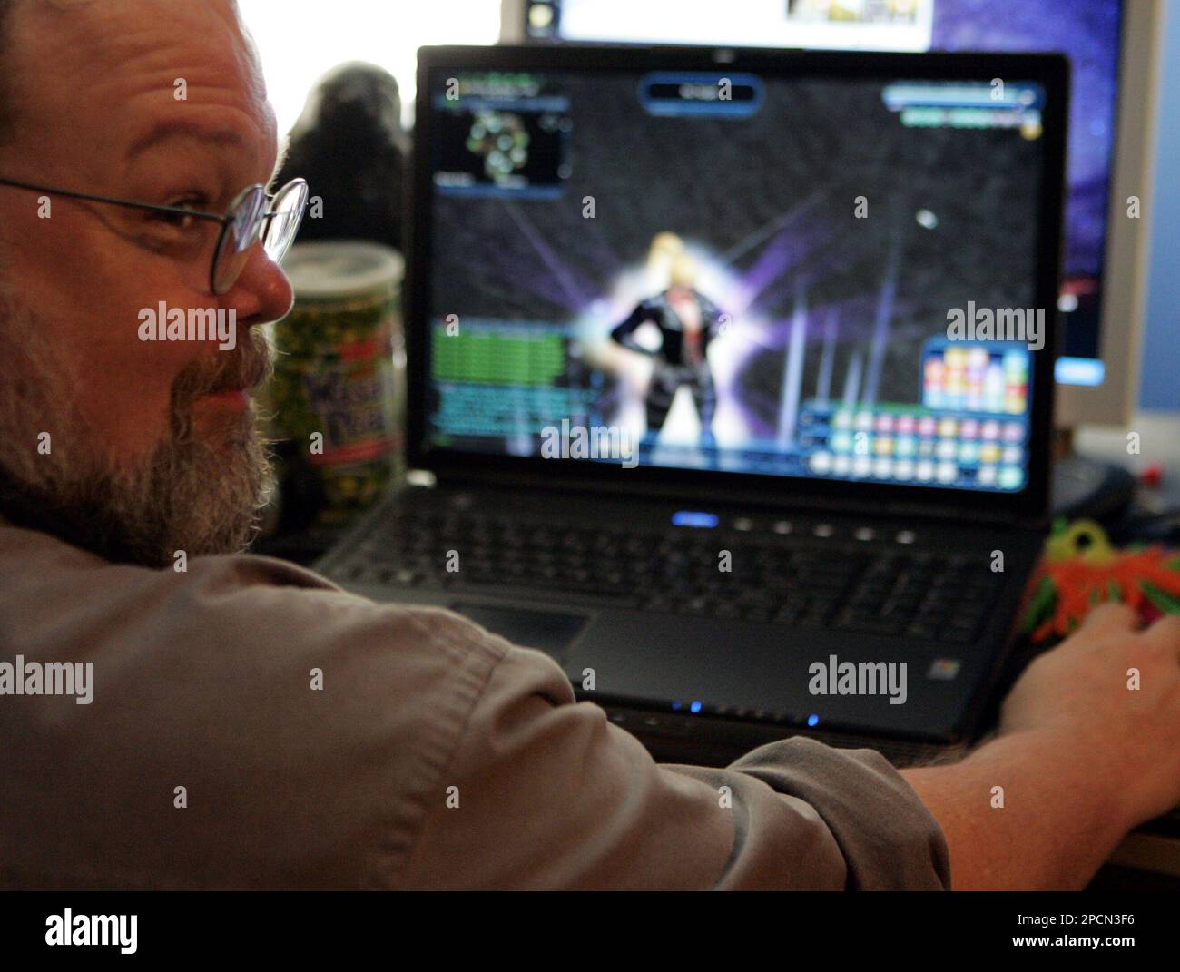 **FILES ** Freeman Williams sits in front of his home computer in this ...