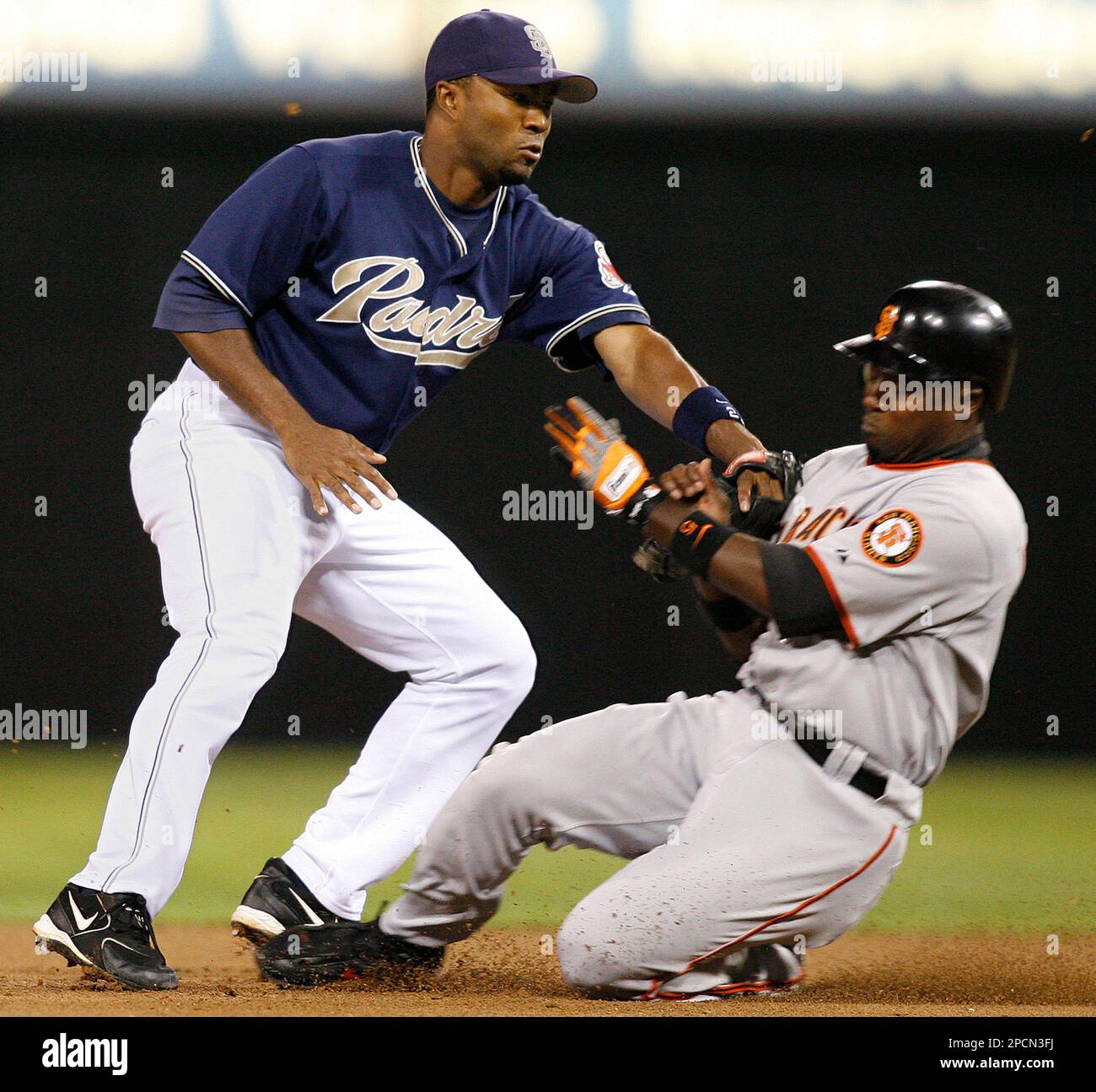 San Diego Padres second baseman Josh Barfield, left, tags out San ...