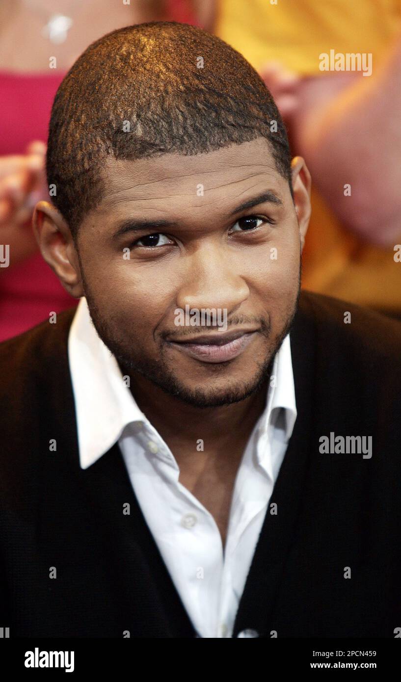 Actor and musician Usher appears on stage during MTV's Total Request ...
