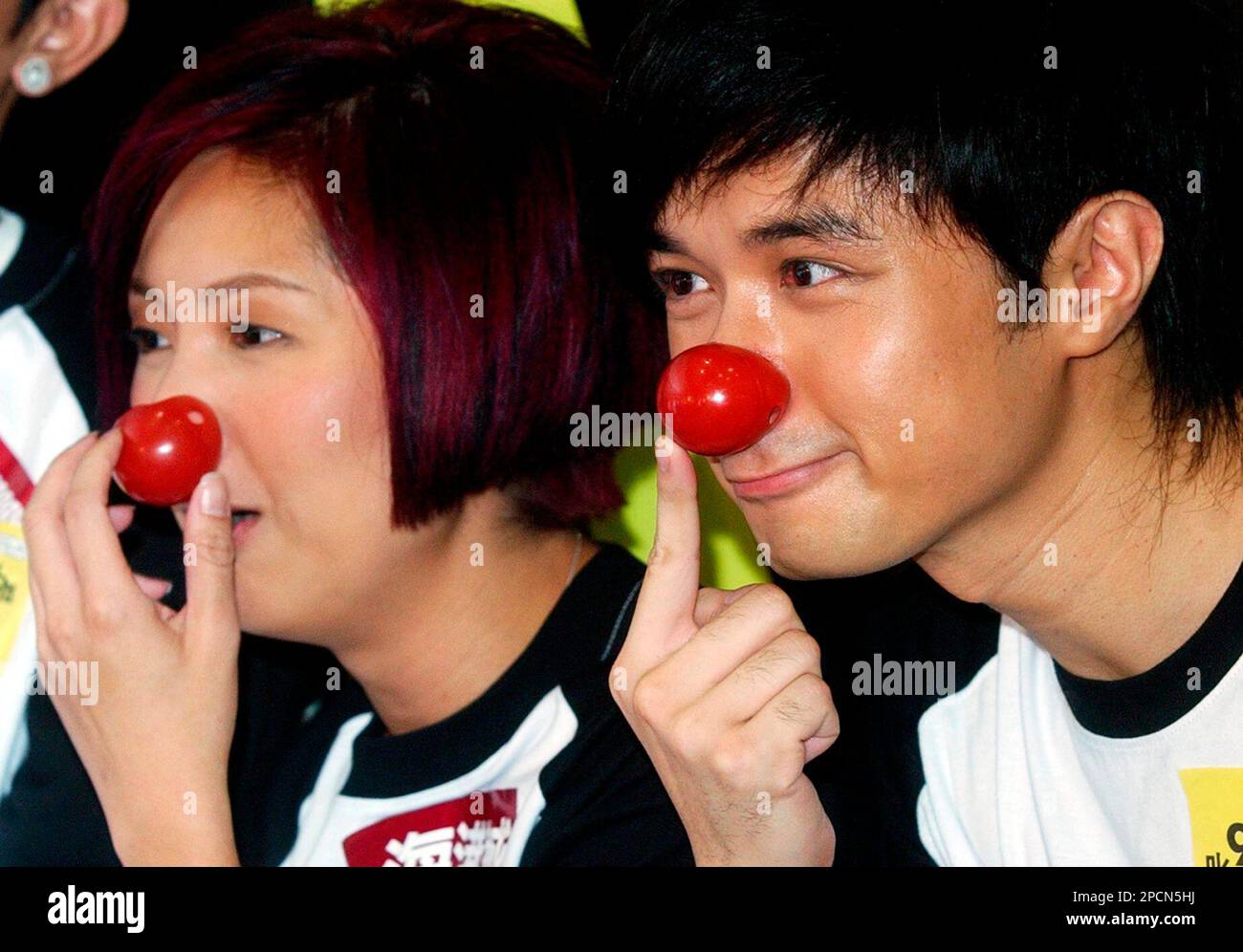 Hong Kong actor and singer Leo Koo, right, and actress Miriam Yeung act ...