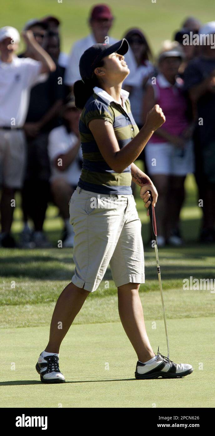 Kimberly Kim, from Hilo, Hi., reacts after dropping a birdie putt on ...