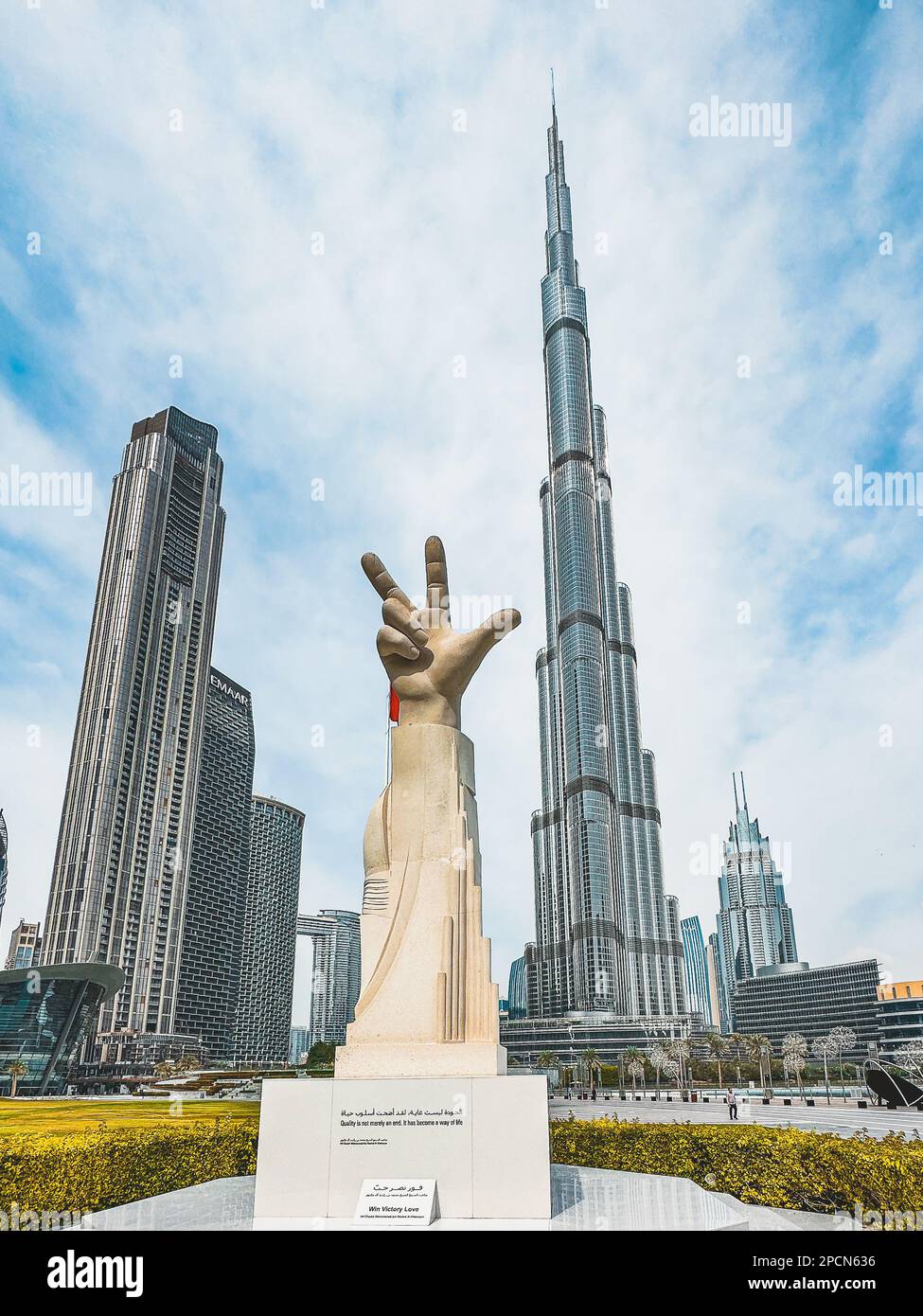 Three Fingers Statue in Burj Park surrounded by skyscrapers in Downtown ...
