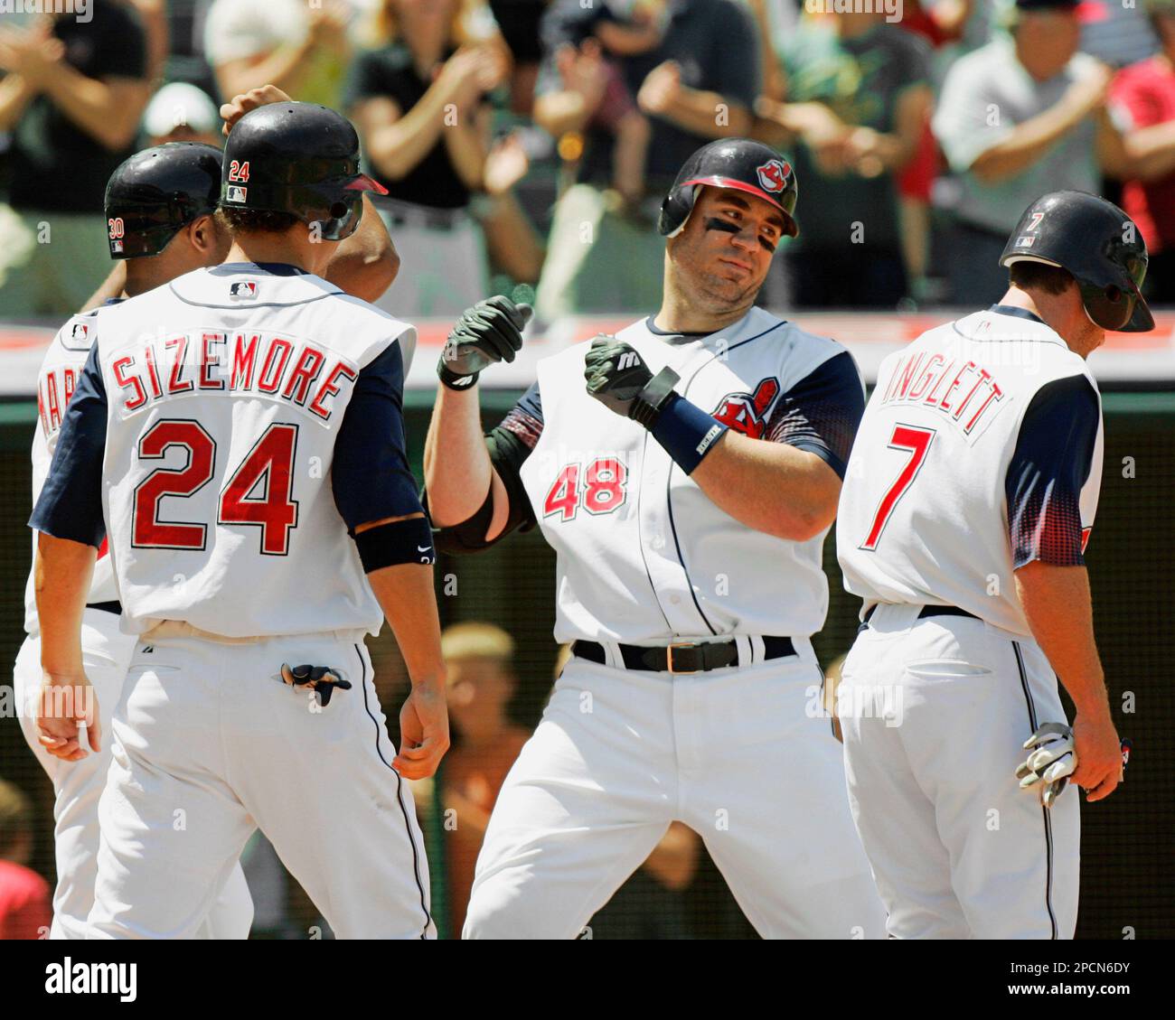 Cleveland Indians' Travis Hafner (48) touches the plate after his first ...