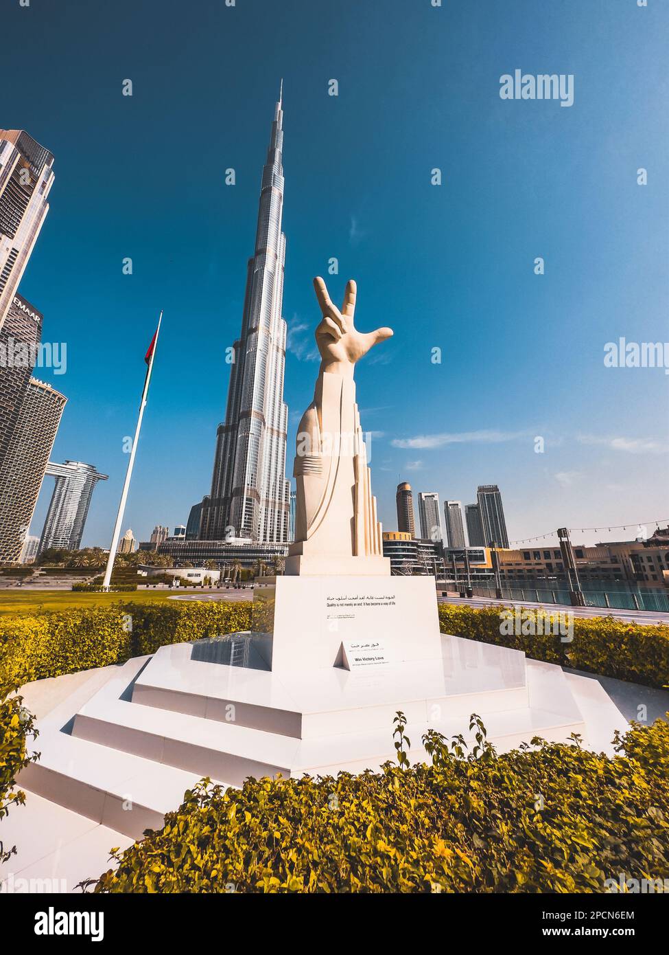 Three Fingers Statue in Burj Park surrounded by skyscrapers in Downtown ...