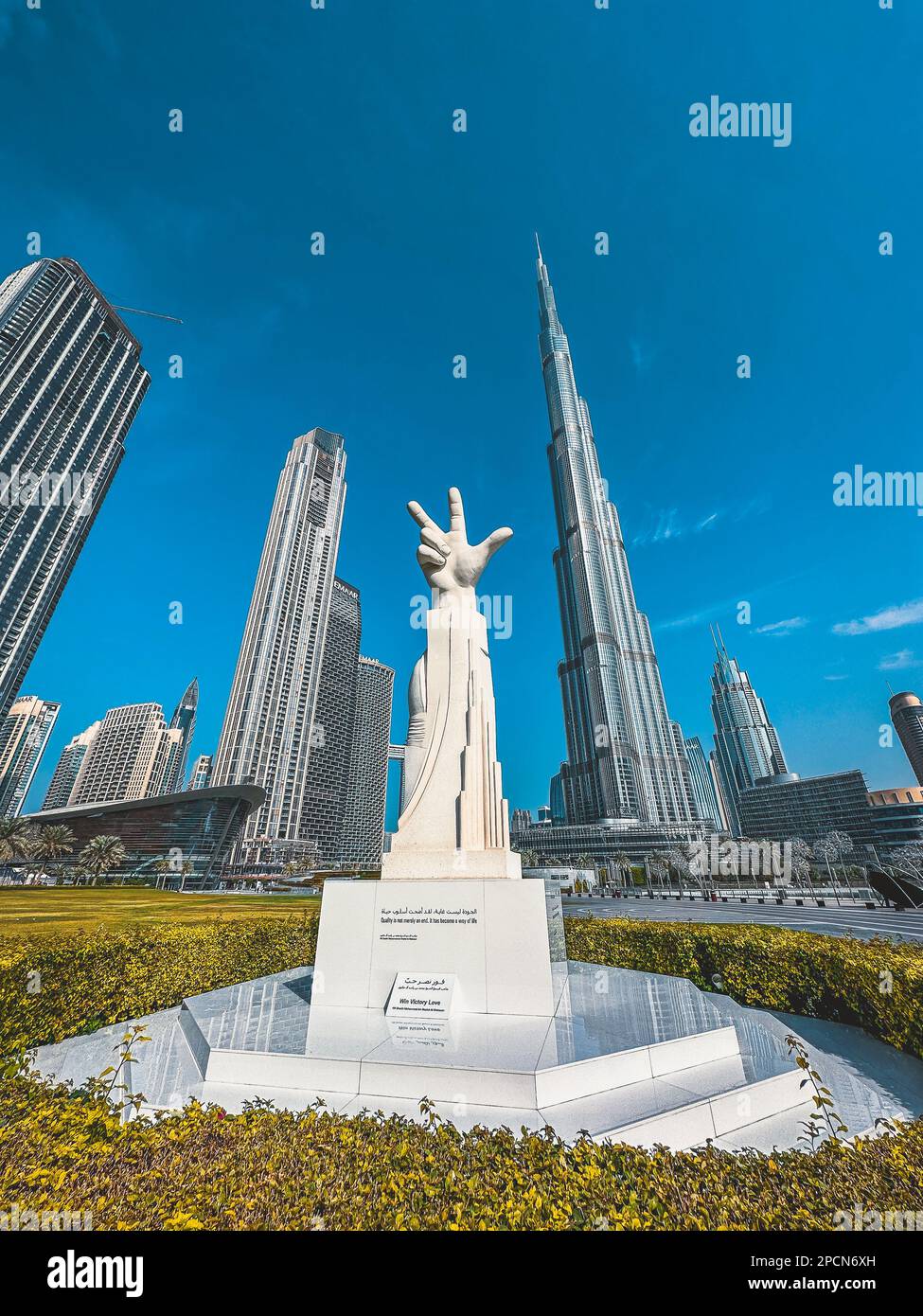 Three Fingers Statue in Burj Park surrounded by skyscrapers in Downtown ...