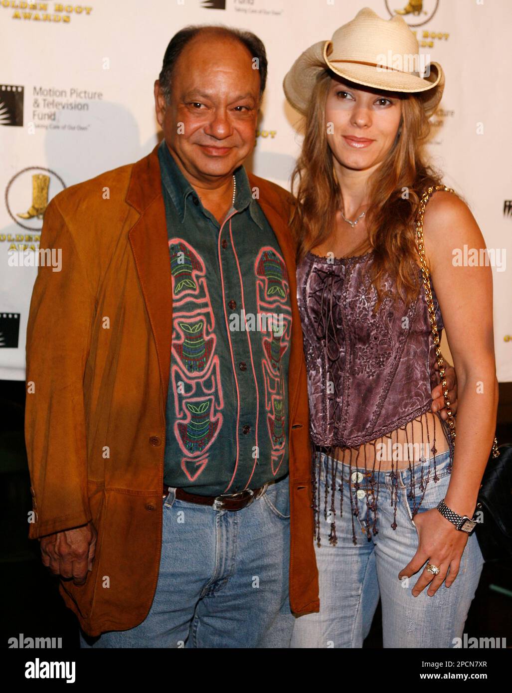 Actor and comedian Cheech Marin, left, and his date Natasha Reuben ...