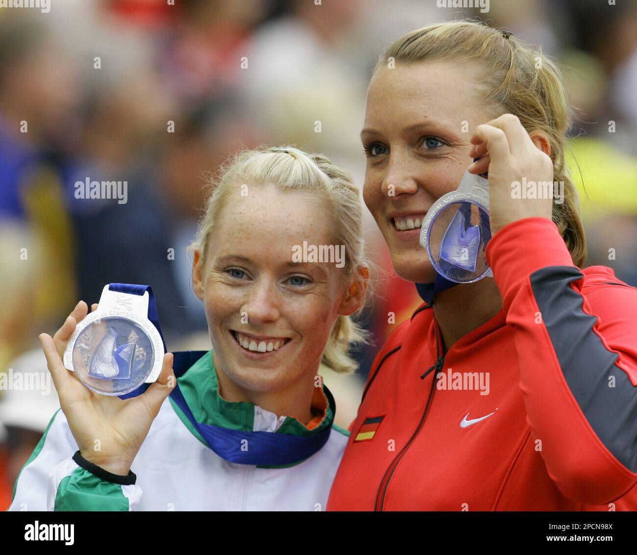 Women's 110 meter hurdles Germany's Kirsten Bolm, right, and Ireland's ...