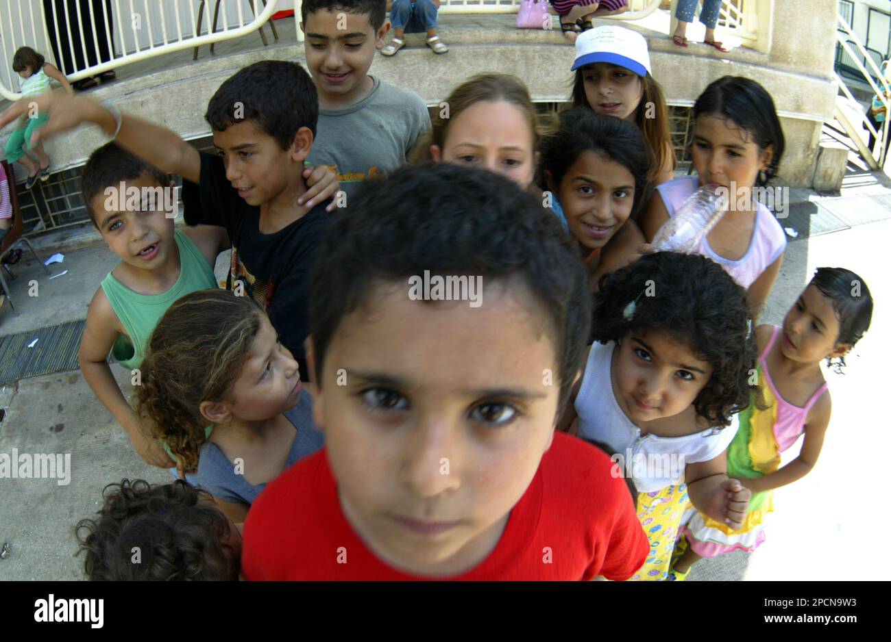 Lebanese children from displaced families look on at the Rafik Hariri ...