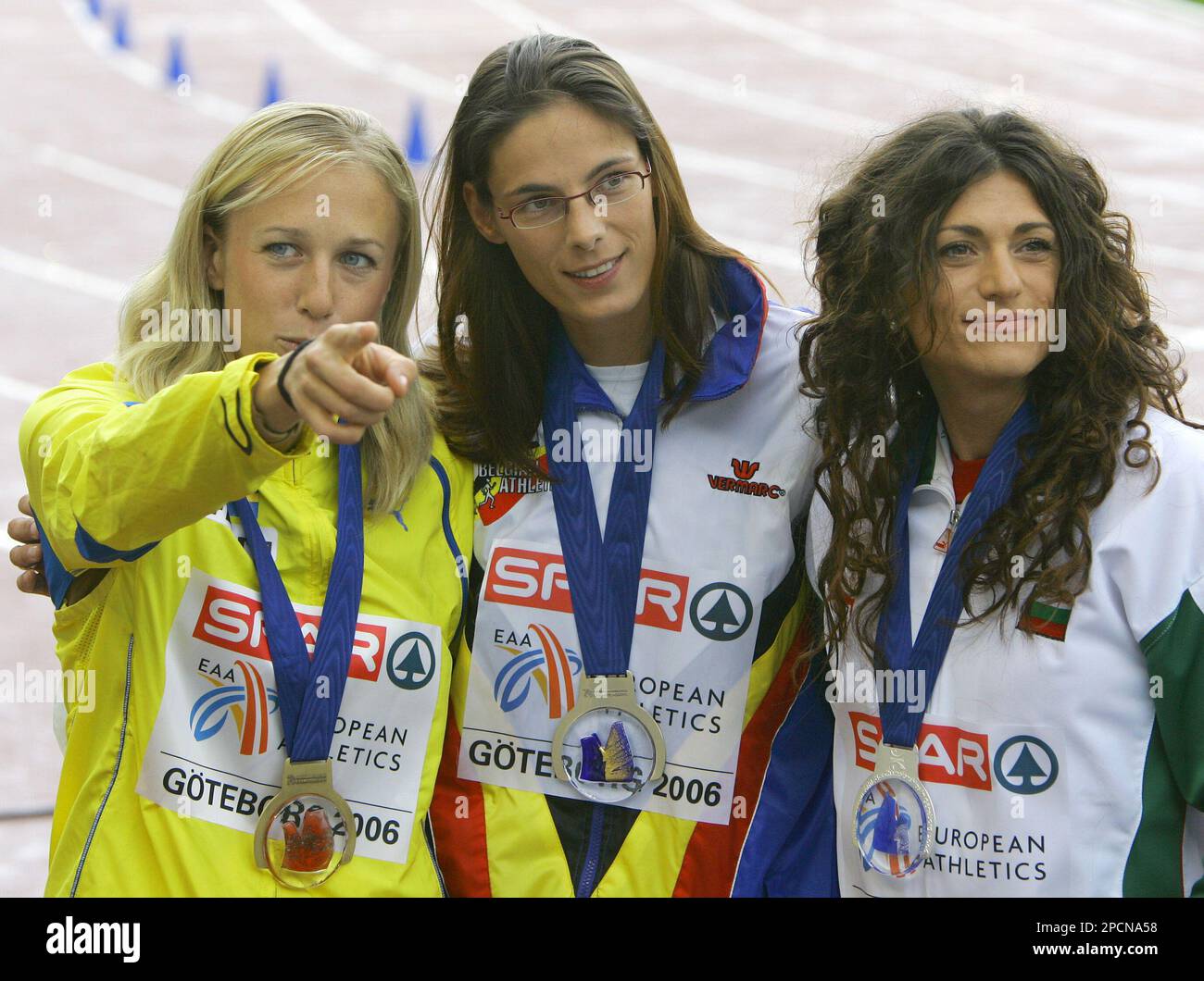 Sweden's Kajsa Bergqvist, bronze, Belgium's Tia Hellebaut, gold, and ...