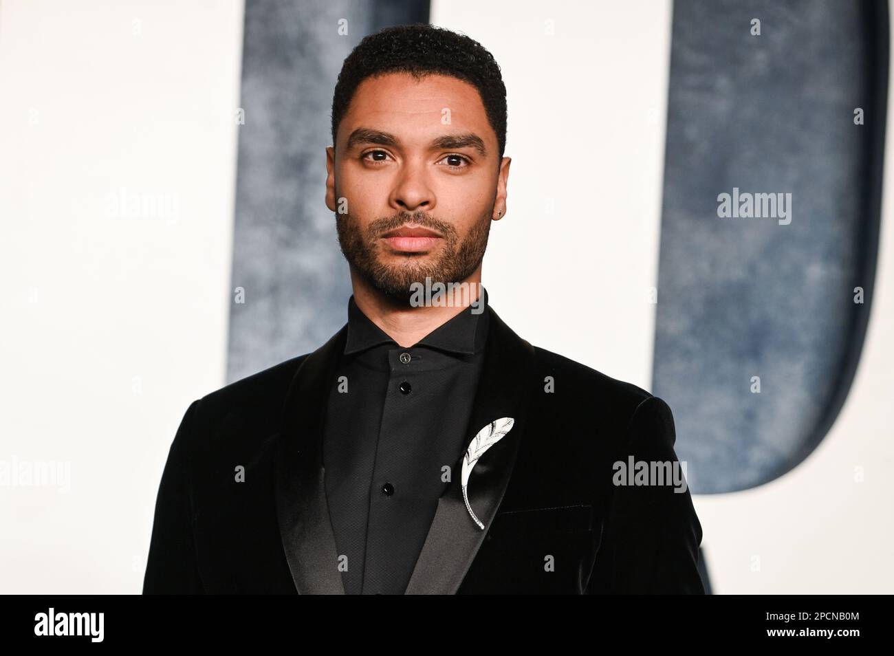 USA. 12th Mar, 2023. Rege-Jean Page walking on the red carpet at the ...