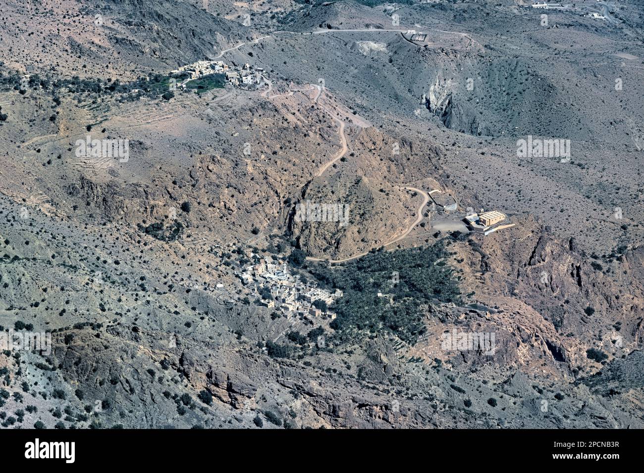 Looking down to Wakan village while trekking in the Western Hajar ...