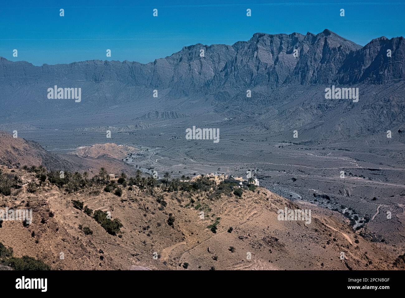 Looking down to Wakan village while trekking in the Western Hajar ...