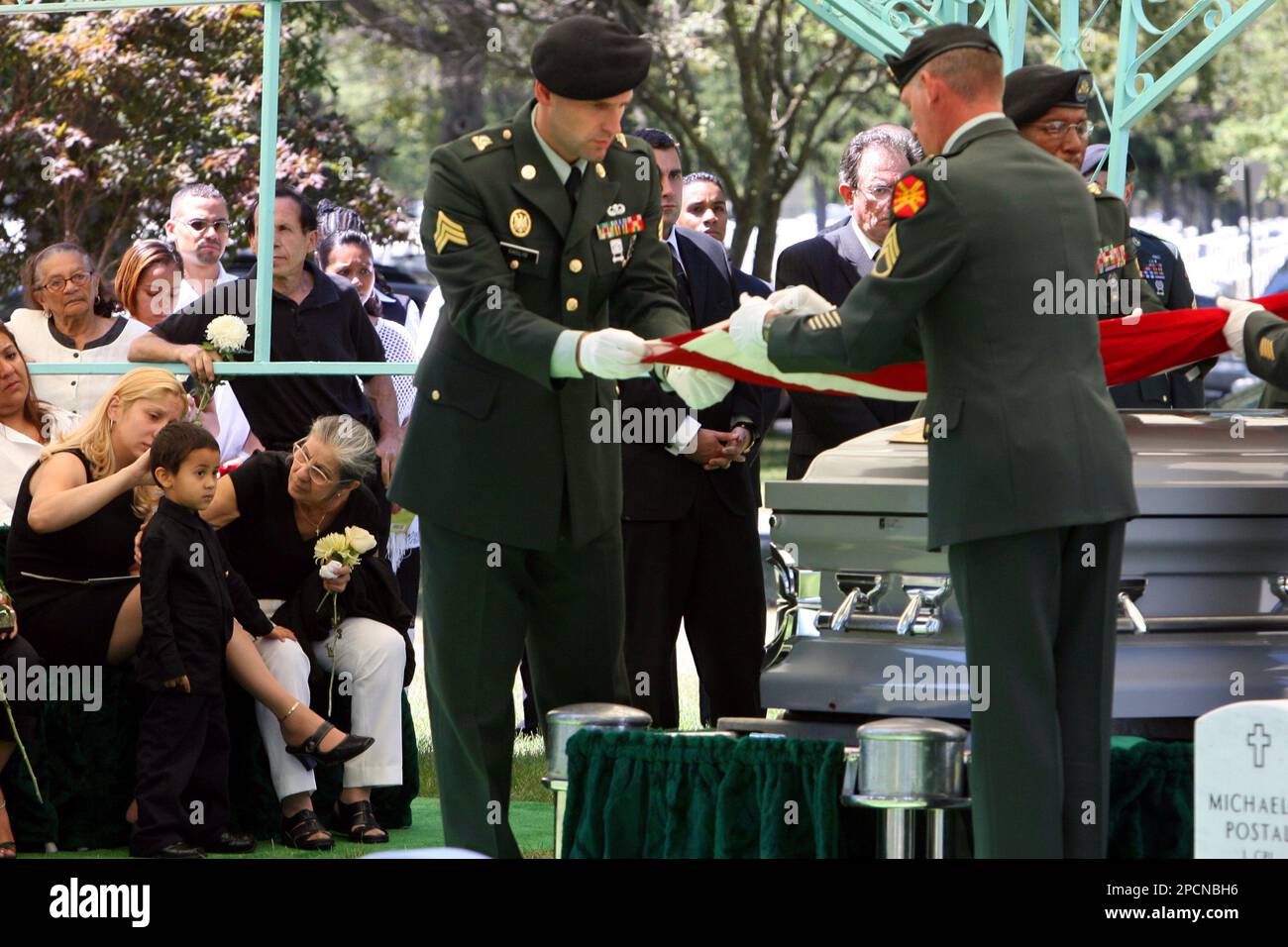 Brandon Alexander Hsia, 3, is consoled by his grandmother Nelida Hsia ...