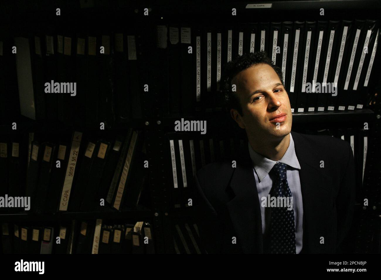 Magnum Photos Director Mark Lubell poses for a picture in front of ...