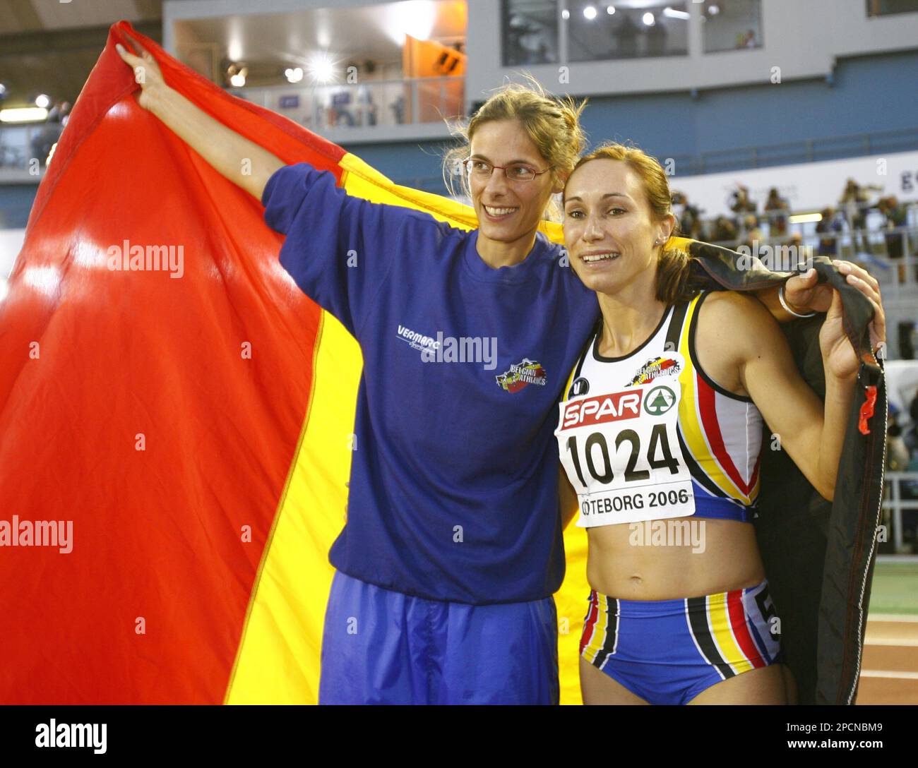 Belgium's Kim Gevaert, right, celebrates winning the gold medal in the ...
