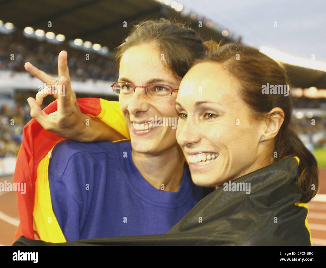 Belgium's Kim Gevaert, right, celebrates winning the gold medal in the ...