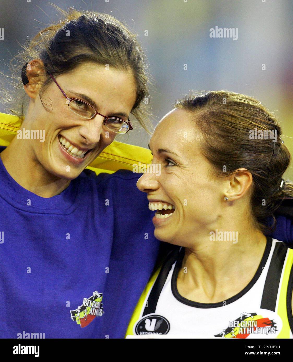 Belgium's Kim Gevaert, right, celebrates winning the gold medal in the ...