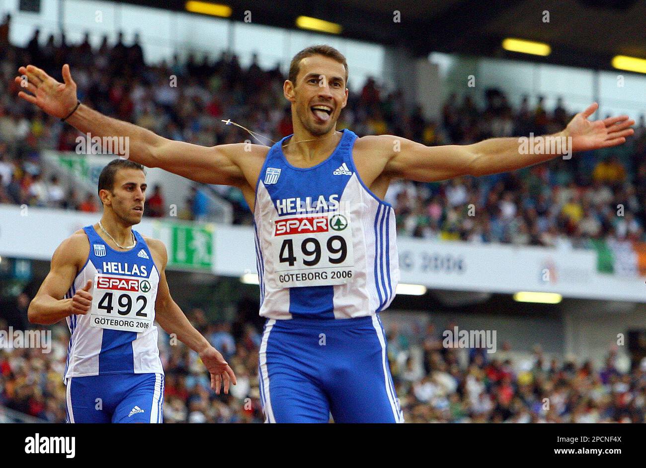 Periklis Iakovakis of Greece celebrates after crossing the finish line ...