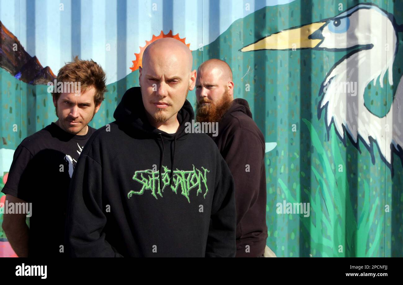 Members of the music group Cattle Decapitation, from left, Josh Elmore ...