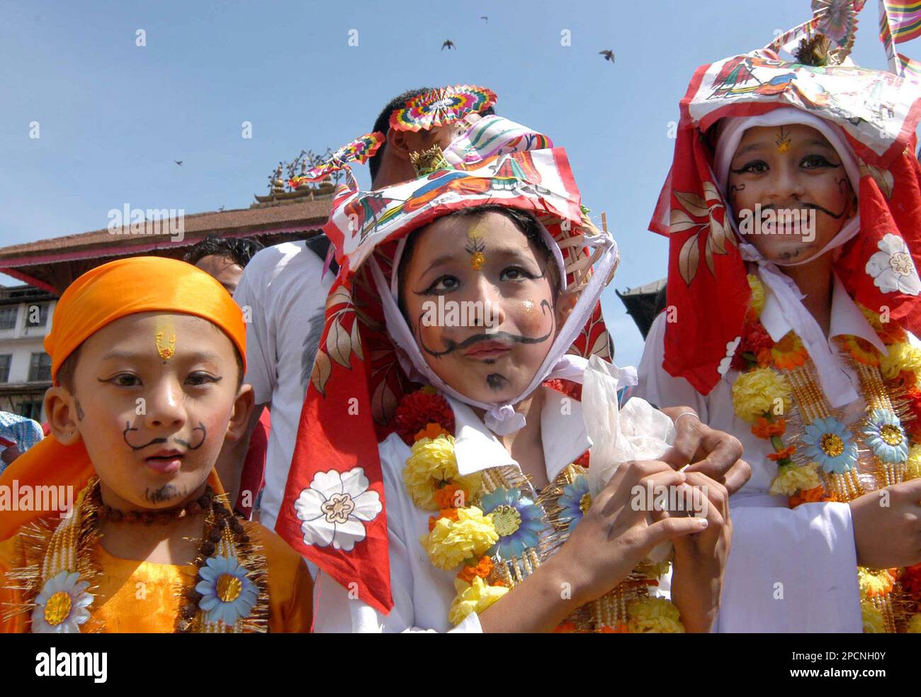 Hindu boys dressed up in festival attire walk around the city to mark ...