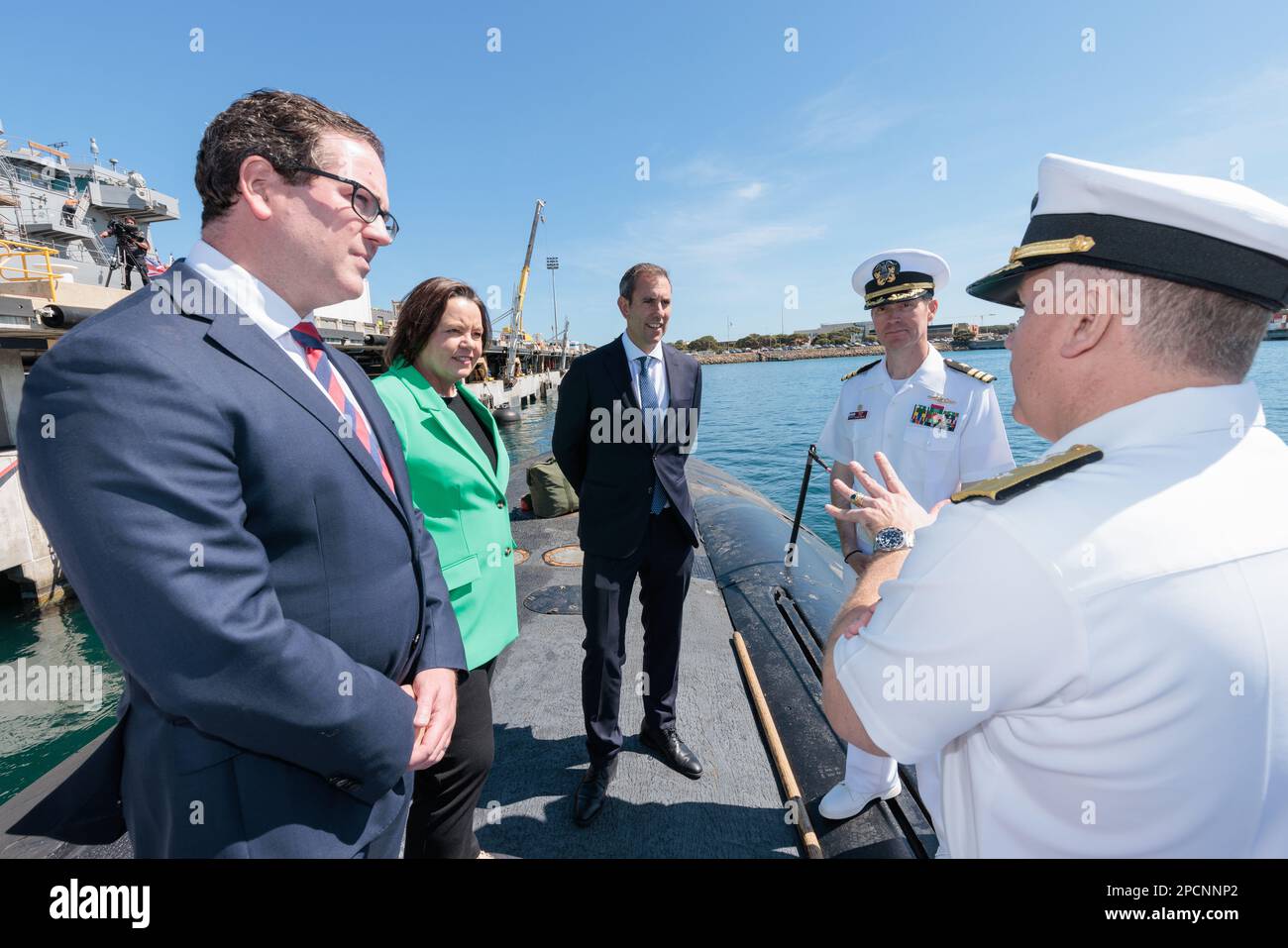 Treasurer Jim Chalmers, talks with Rear Admiral Richard Seif, Commander ...
