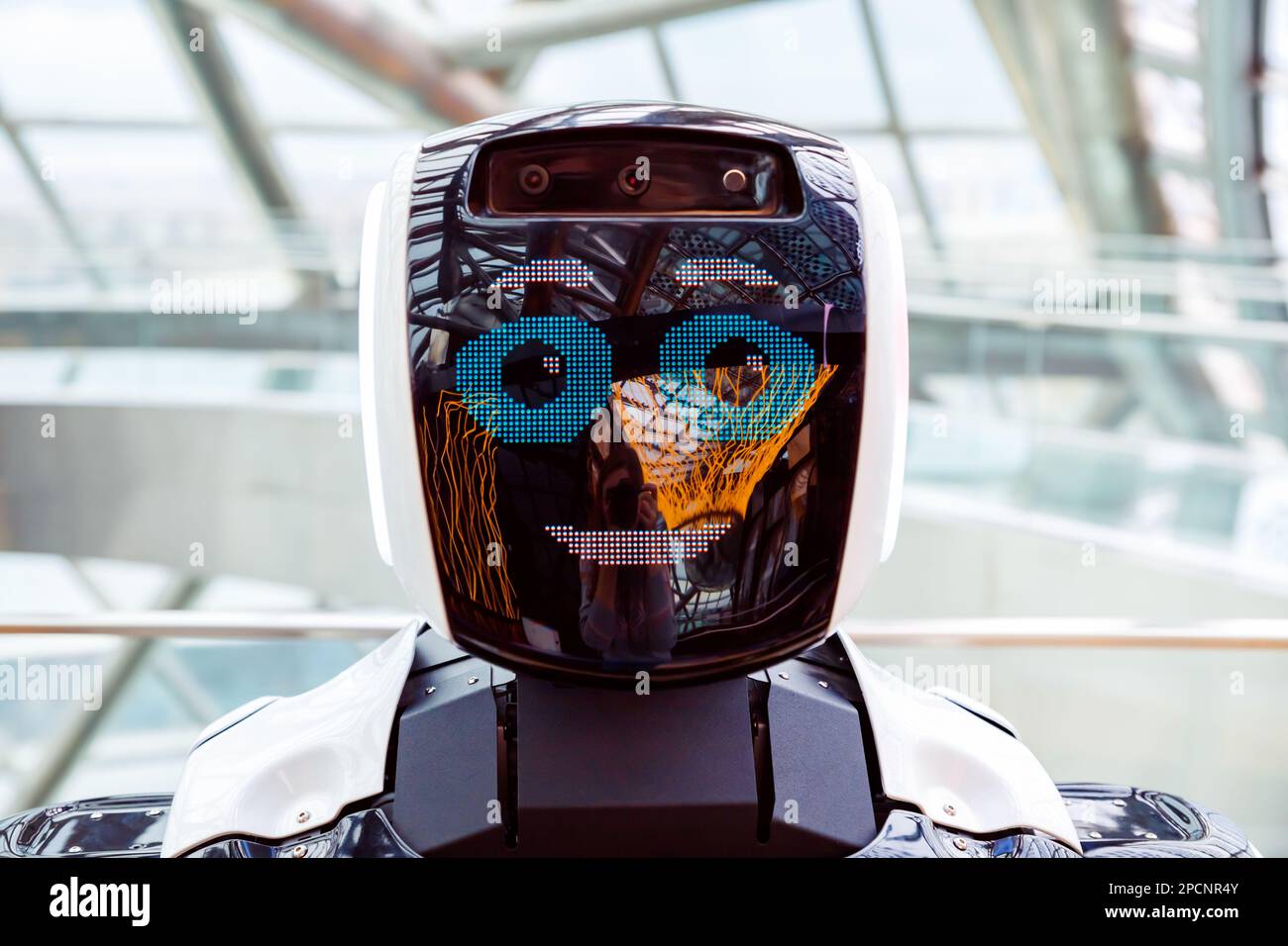 robot portrait close-up. smiling face of robot. Autonomous personal ...