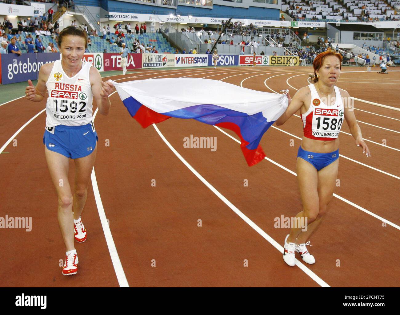 Gold medalist Inga Abitova of Russia, right, and teamate Lidiya ...