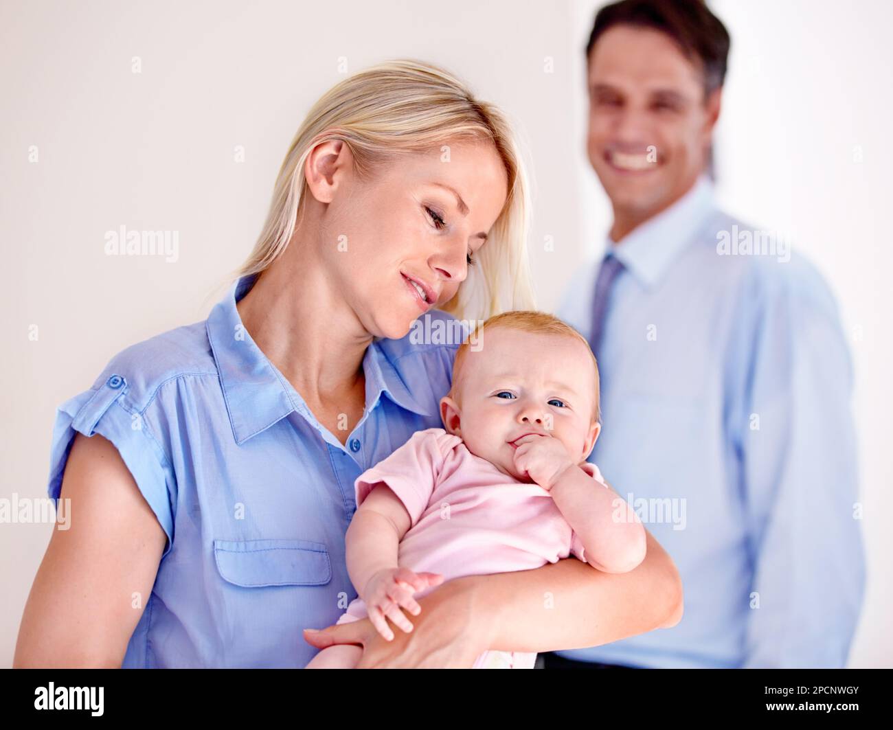 My perfect family. Young beautiful mother holding her cute baby with ...