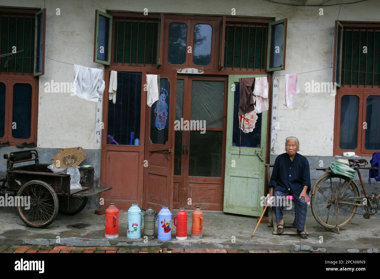 The grandmother of an 8-year-old boy, Wang Hongli, who likely died from ...
