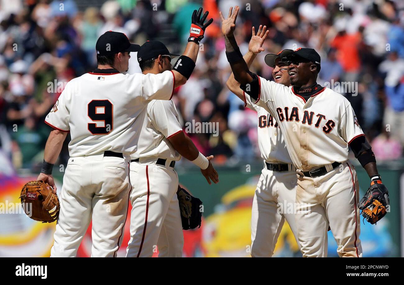 San Francisco Giants', from left, Mark Sweeney, Pedro Feliz, Omar ...