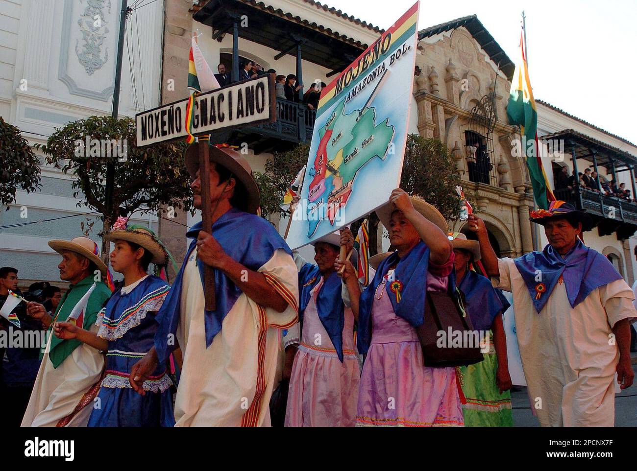 Holding a Bolivian map, indigenous people of the Amazonian region ...