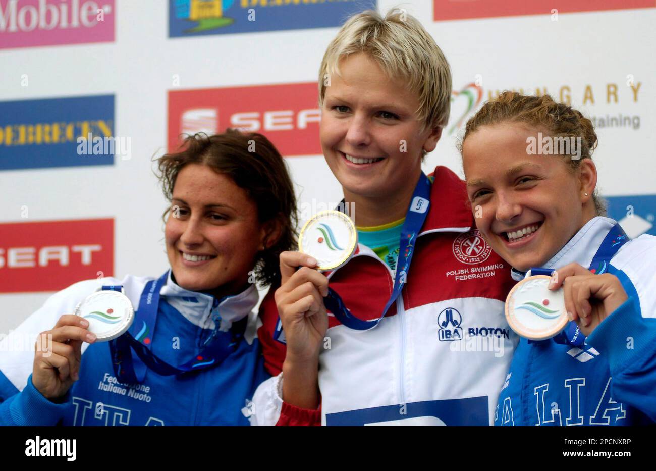 Silver medalist Francesca Segat of Italy, gold medalist Otylia Jedrzejczak of Poland and bronze ...