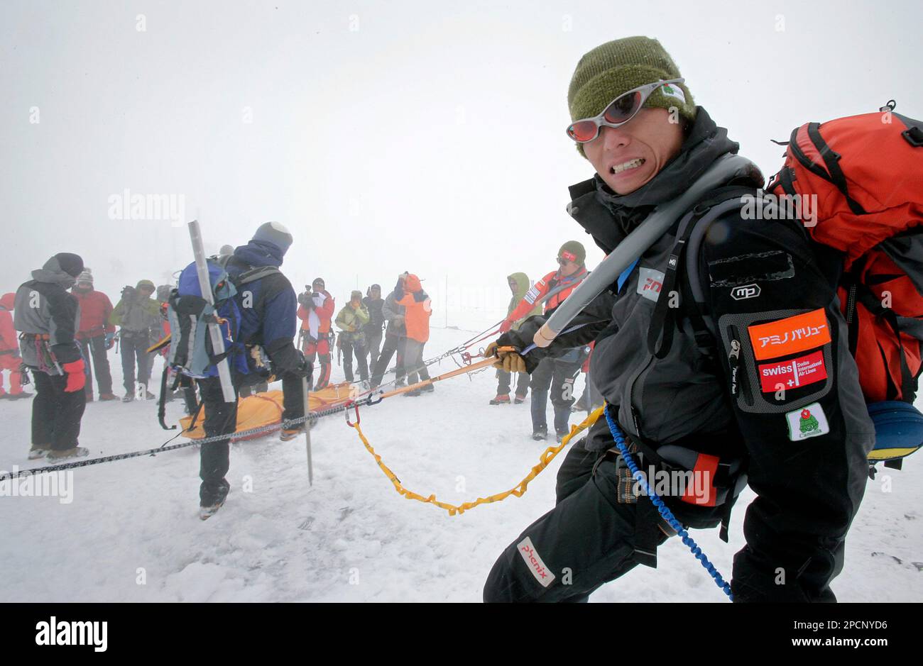 Members of the expedition with the hybrid assistive limb (HAL) robot ...