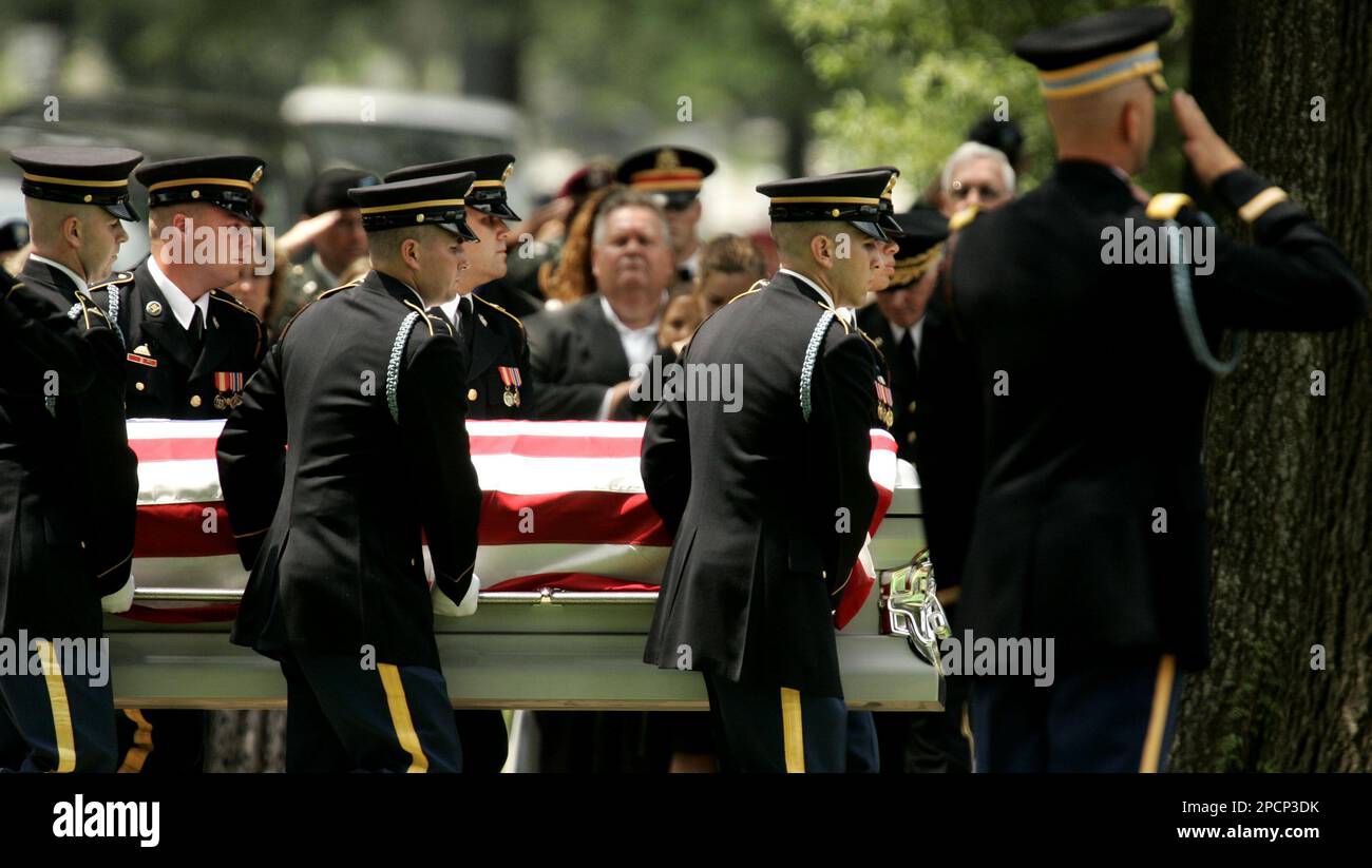 Army honor guard carry the remains of Army 1st Sgt. Christopher ...