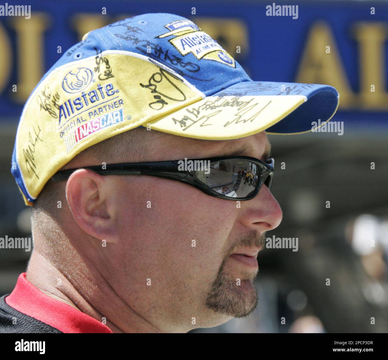Rich Chaplin of Kokomo, Ind., wears his hat, bearing the autographs of ...