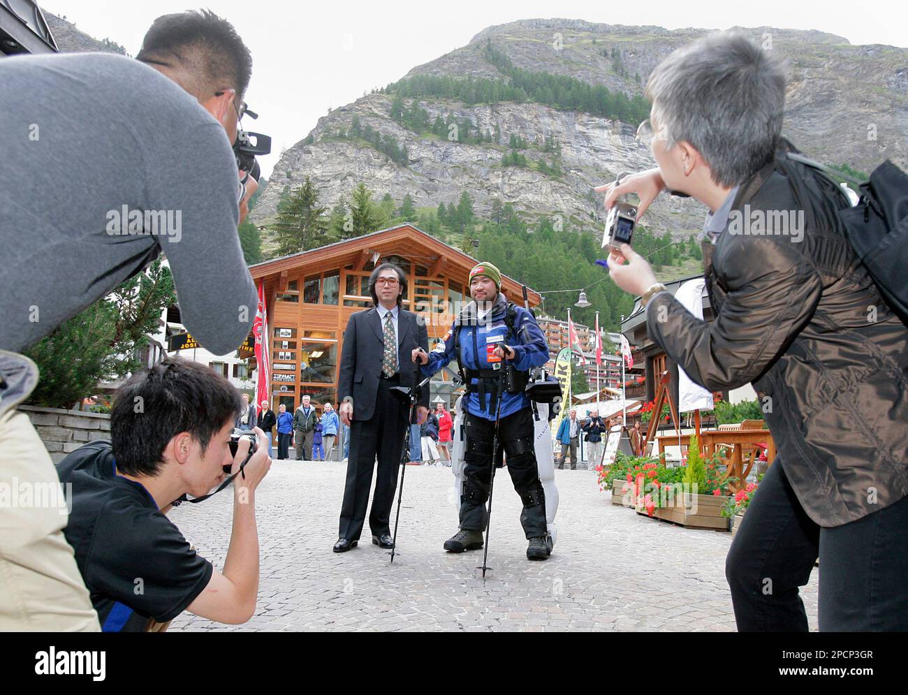 Japanese professor Yoshiyuki Sankai, left, and Alpinist Takeshi ...
