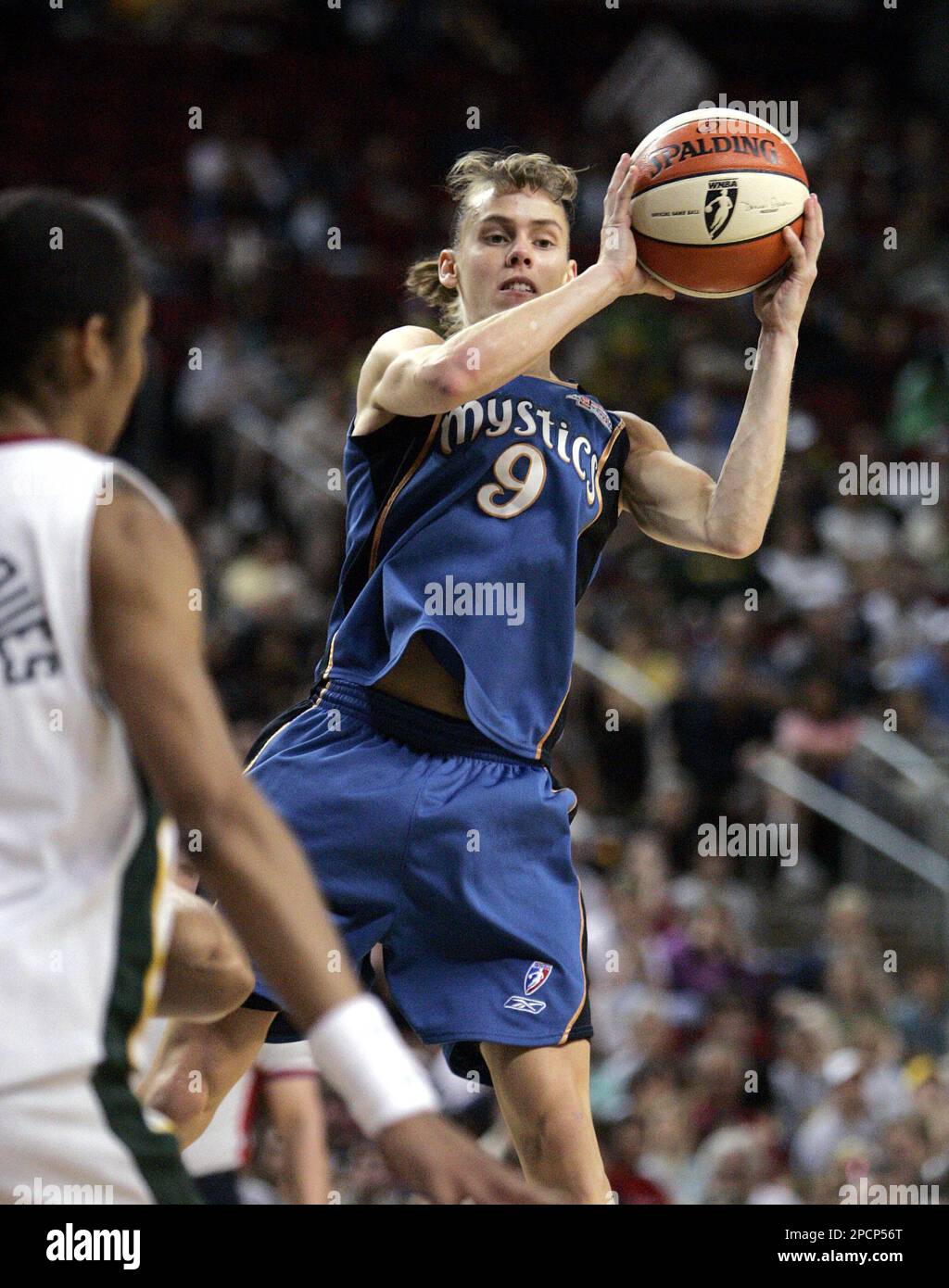 Washington Mystics' Coco Miller (9) leaps to make a pass in front of ...